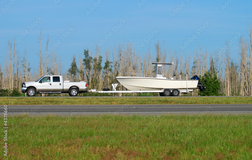 Pickup truck towing fishing boat Stock Photo | Adobe Stock