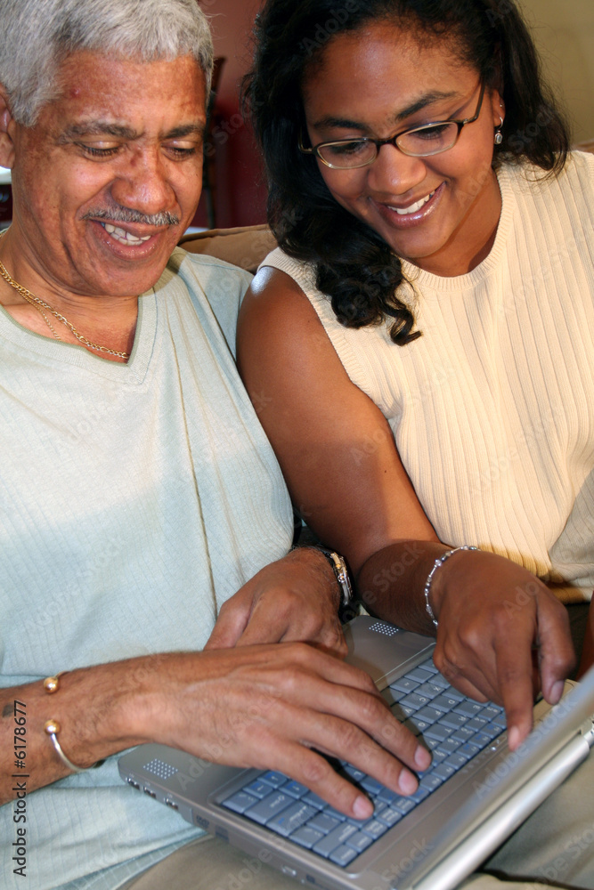 Father and Daughter on Computer Stock Photo | Adobe Stock