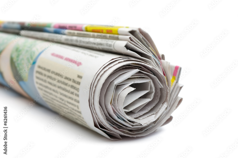 Roll of newspapers, isolated on white background Stock Photo | Adobe Stock