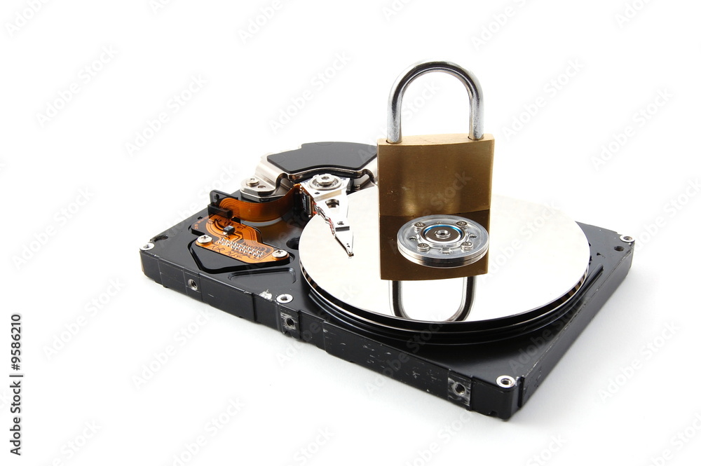 computer hard disk drive and a padlock Stock Photo | Adobe Stock