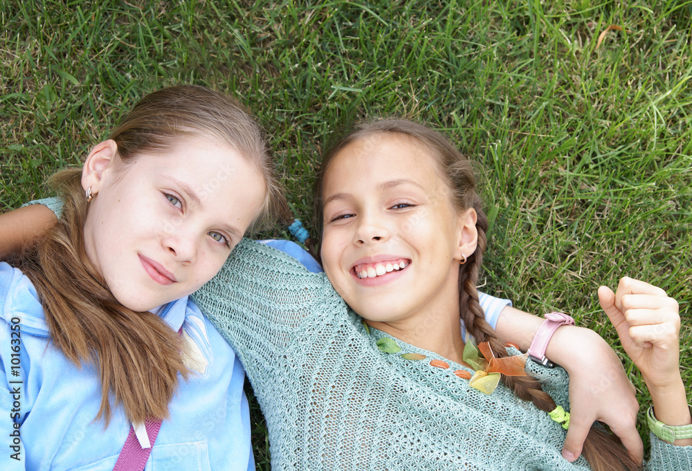 Two preteen girl having fun outdoors Stock Photo | Adobe Stock