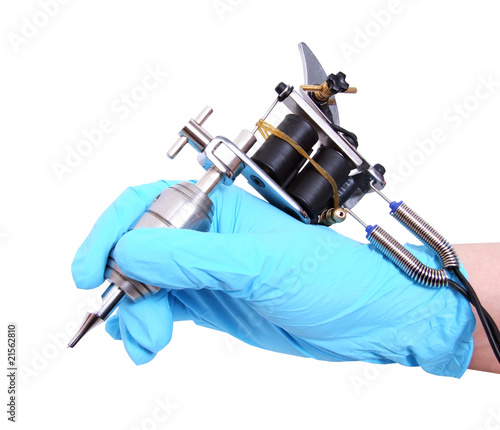 Hand holding tattoo machine Stock Photo | Adobe Stock