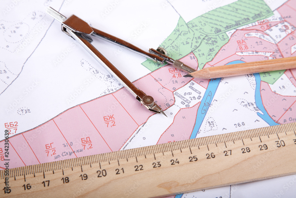 Topographic map of district with measuring instrument and a pen Stock ...
