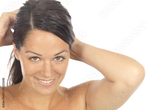 Young Woman Putting Hair Up. Model Released Stock Photo | Adobe Stock