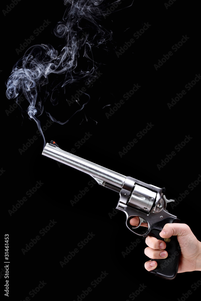 revolver with smoke Stock Photo | Adobe Stock