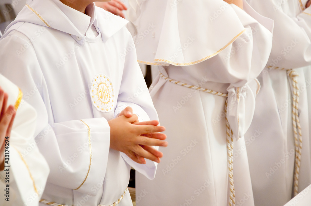 children accepting the first Holy Communion Stock Photo | Adobe Stock