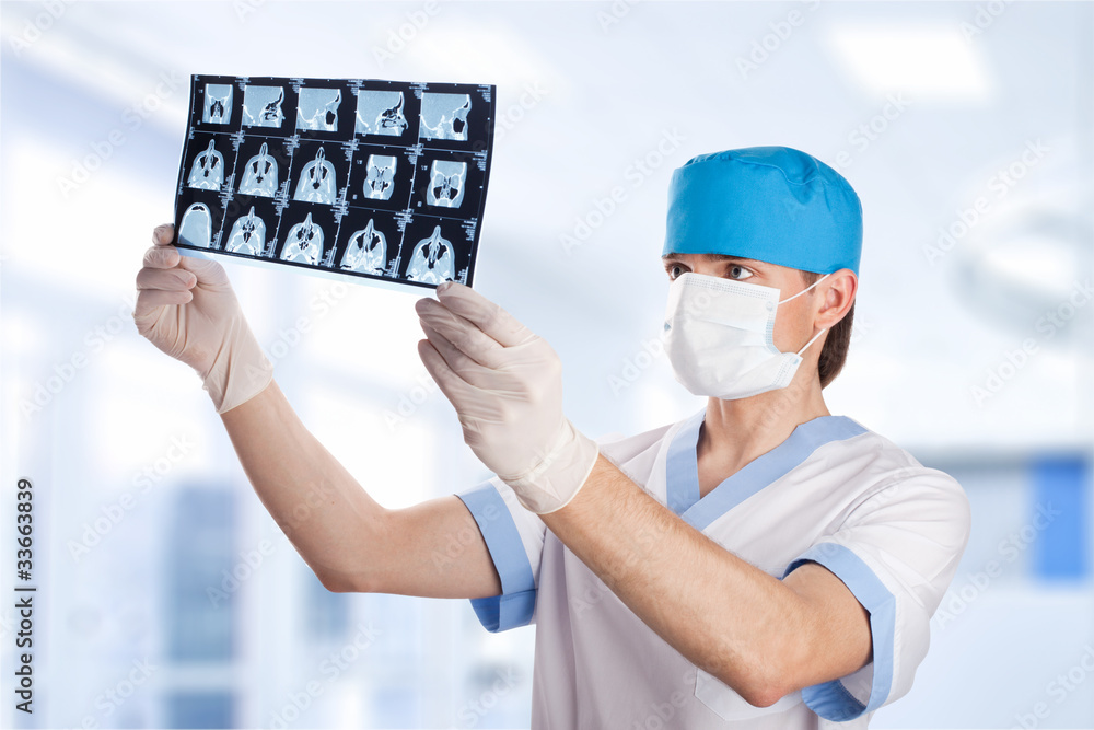 medical doctor looking at CT computer tomography scan image in h Stock ...