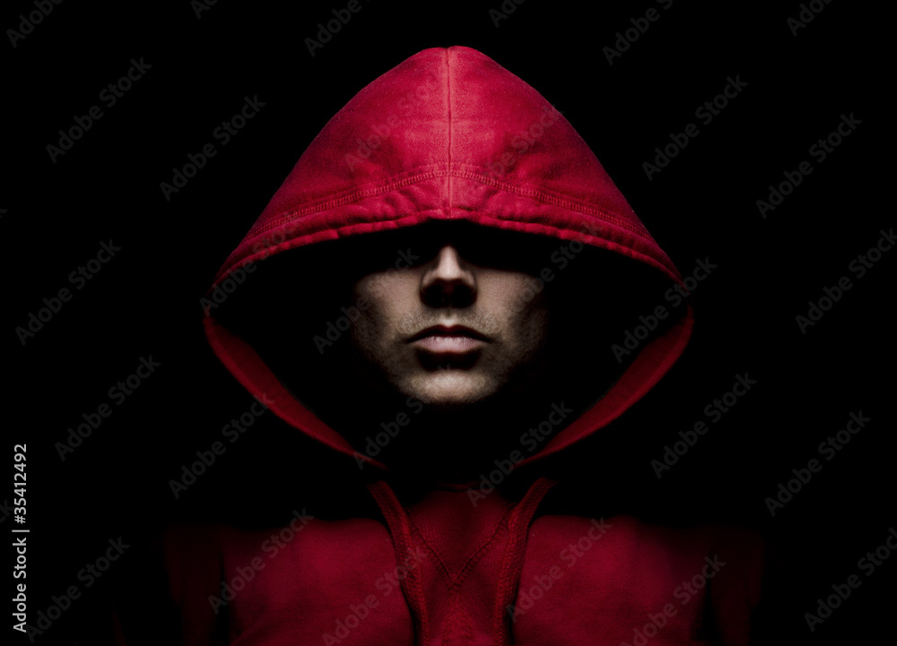 Red hooded male Stock Photo | Adobe Stock