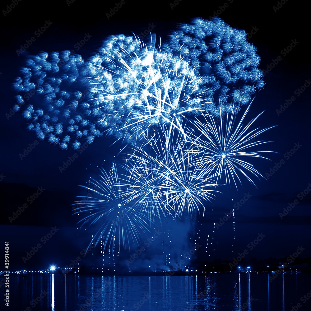 Celebratory blue firework Stock Photo | Adobe Stock