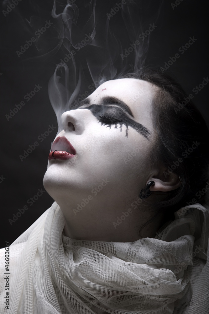Vampire woman smoking Stock Photo | Adobe Stock