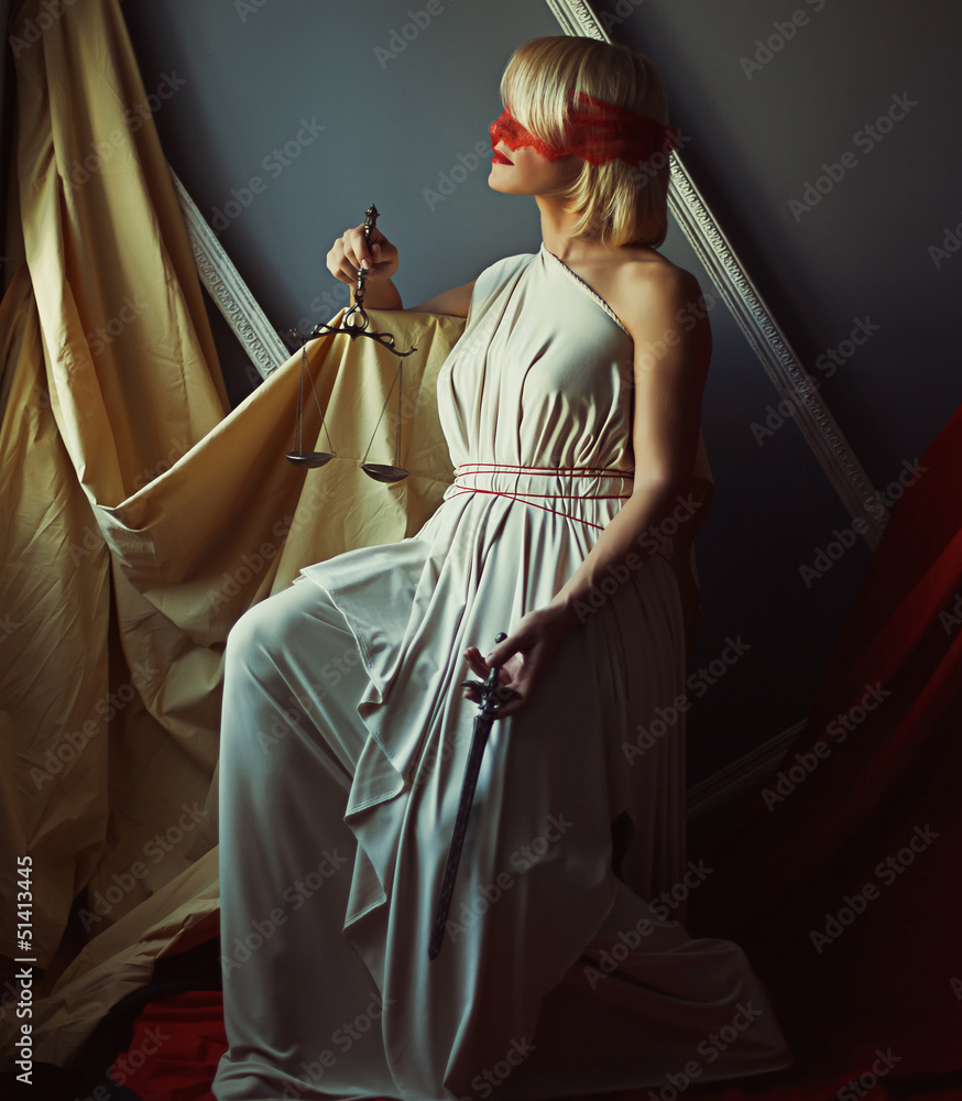 Themis: art photo of young blond woman with scales as sign of justice ...