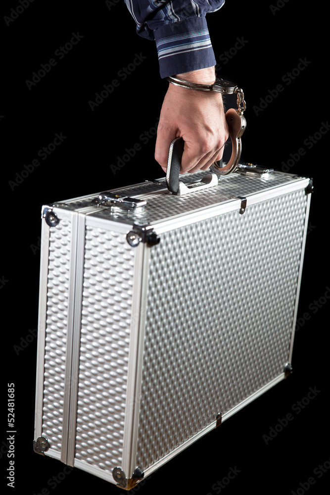 Briefcase handcuffed to businessman's wrist Stock Photo | Adobe Stock