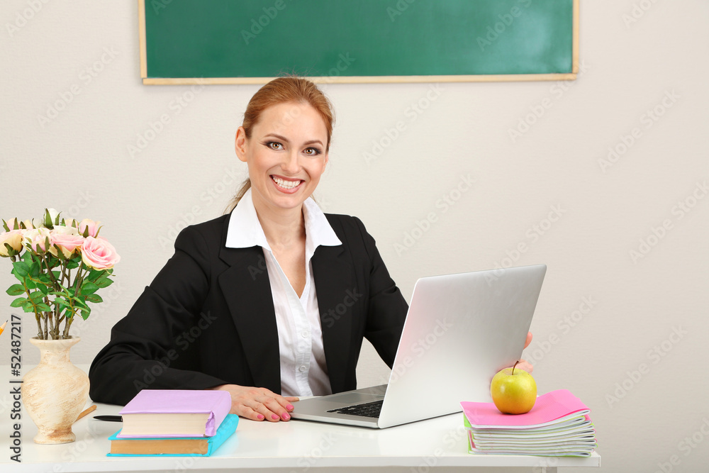Portrait of teacher woman working in classroom Stock Photo | Adobe Stock