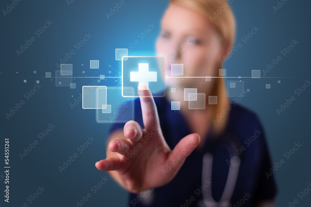 Young nurse pressing modern medical type of buttons Stock Photo | Adobe ...
