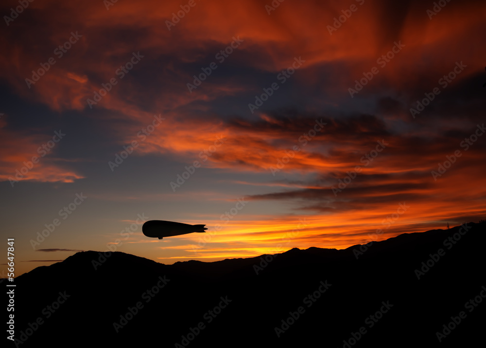 Dirigible aka airship aka blimp at dusk, sunset Stock Photo | Adobe Stock