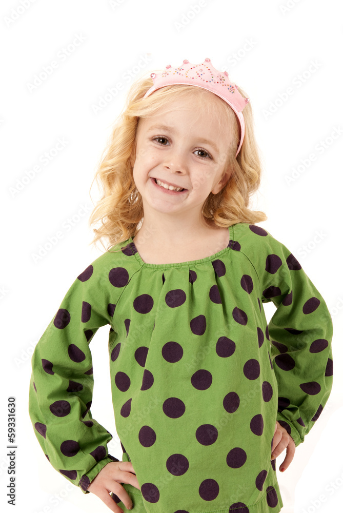 blond girl wearing a pink tiara standing smiling Stock Photo | Adobe Stock