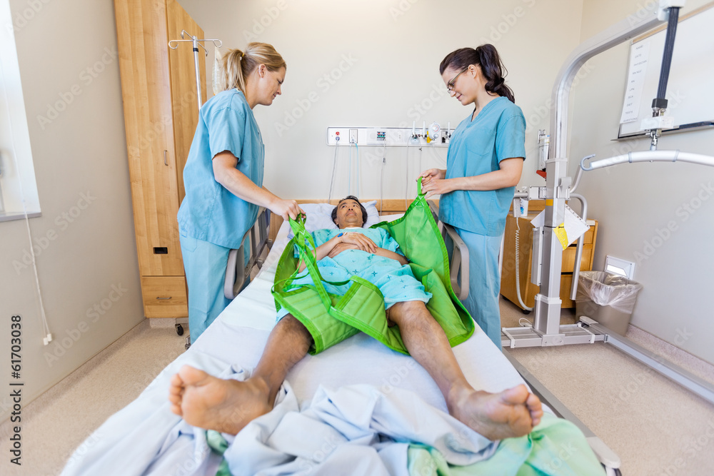 Nurses Preparing Male Patient Before Transferring Him On Hydraul Stock ...
