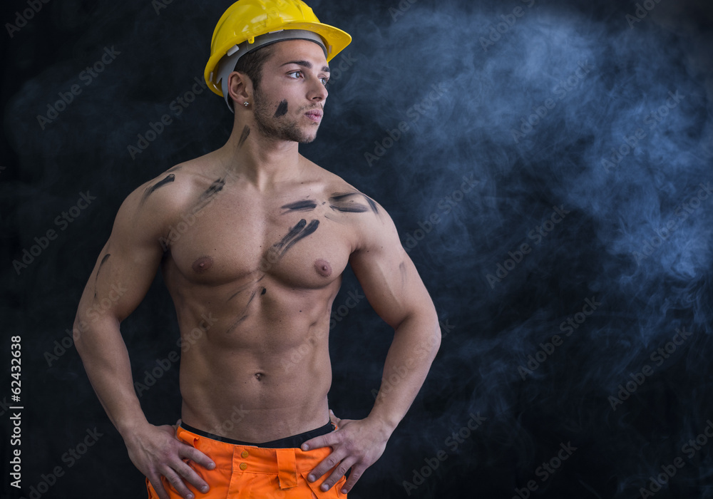 Muscular young construction worker shirtless wearing hardhat Stock ...