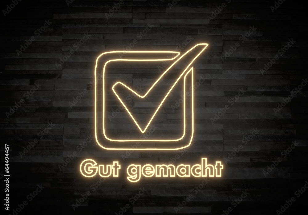gut gemacht german for well done label on classy stone wall Stock ...