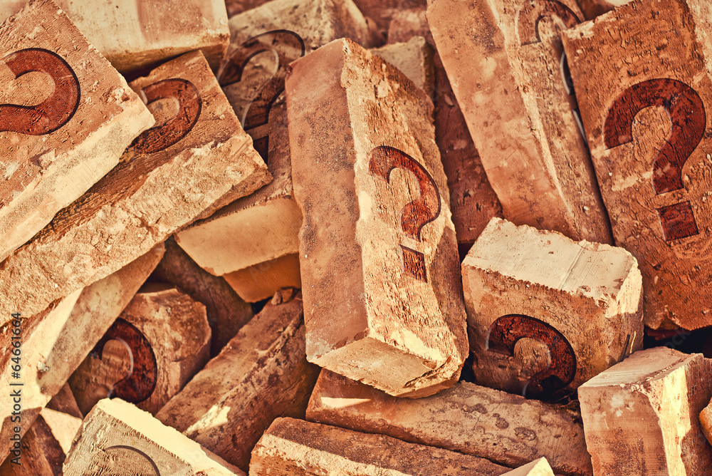Pile of bricks with question marks Stock Photo | Adobe Stock