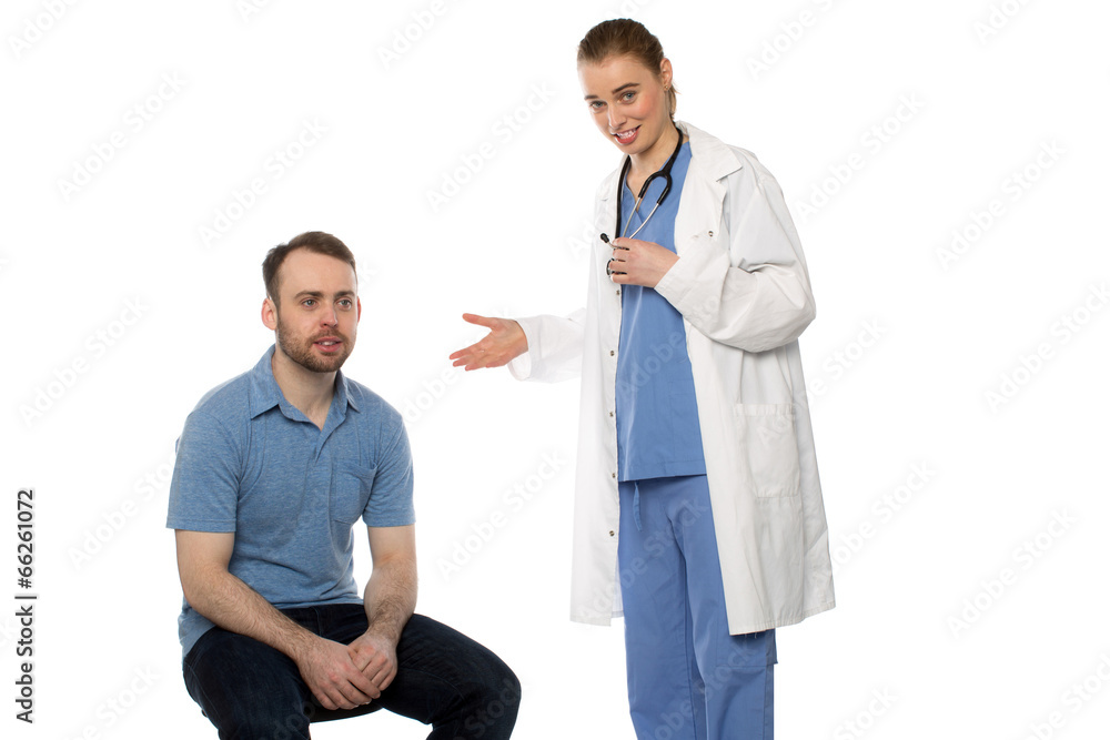 Female doctor presenting male patient Stock Photo | Adobe Stock