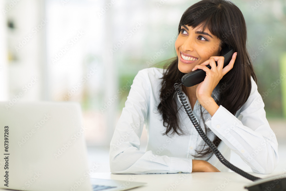 indian office worker talking on the phone Stock Photo | Adobe Stock