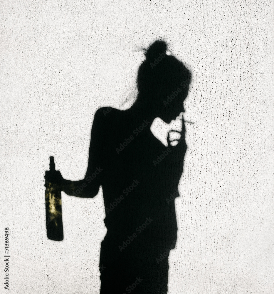 Shadow of girl smoking around on wall background Stock Photo | Adobe Stock