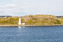 Lighthouse Over Blue Water Free Stock Photo - Public Domain Pictures