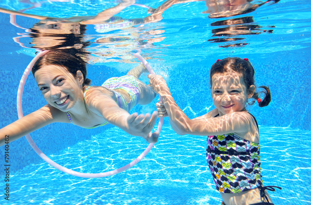 Happy children swim in pool underwater, girls swimming Stock Photo ...