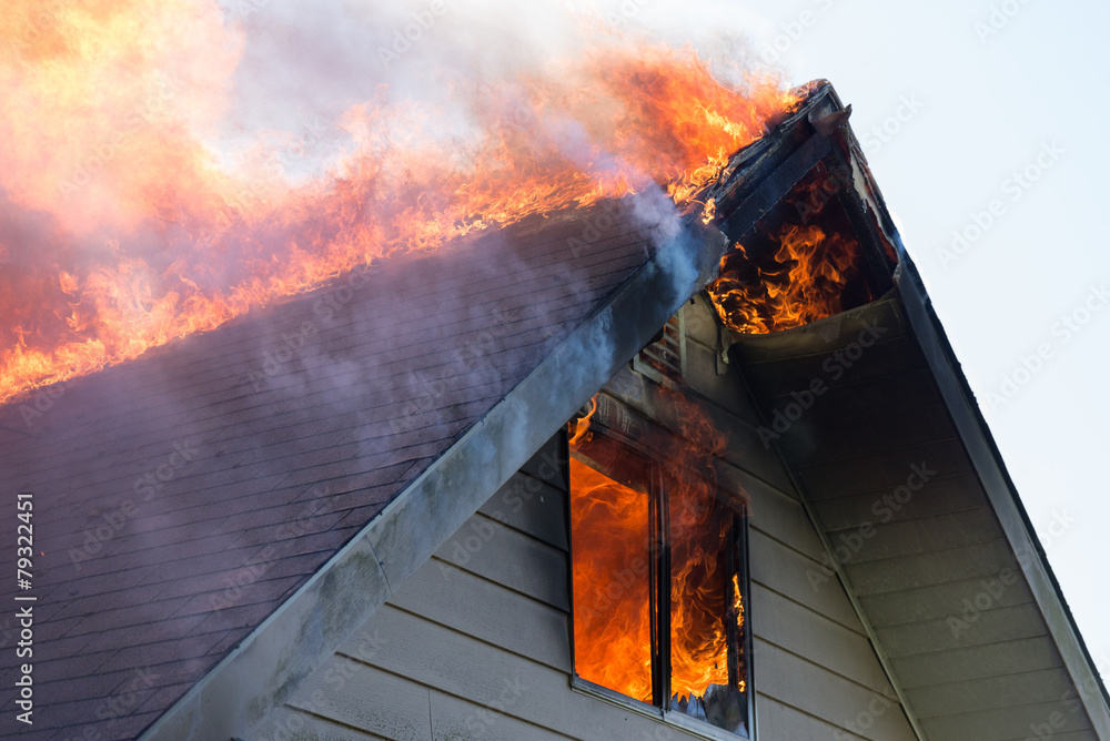 Rooftop blaze Stock Photo | Adobe Stock