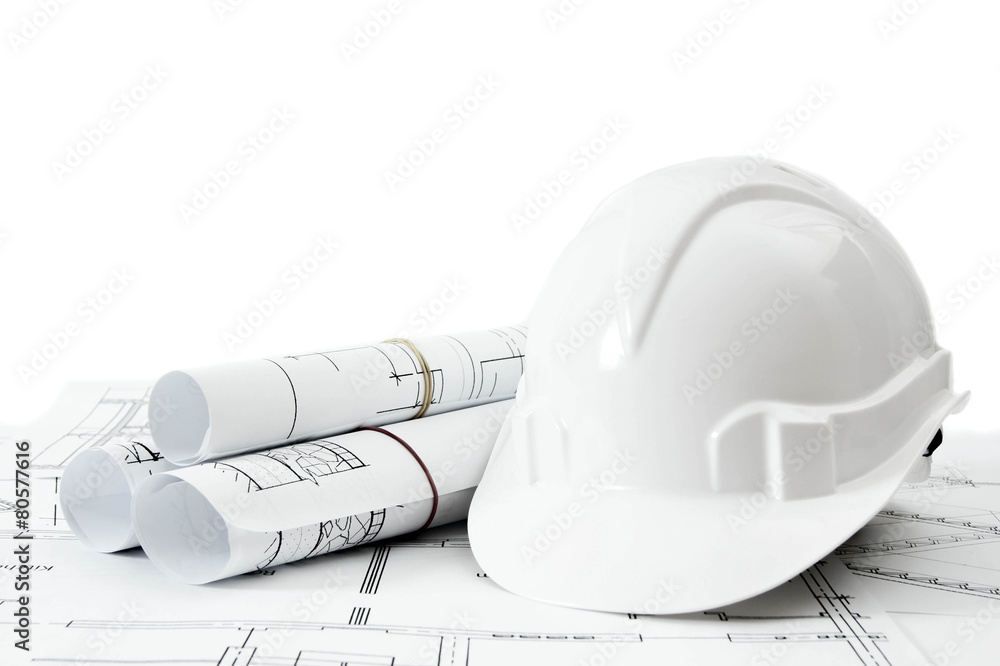 Repair work. Drawings for building and helmet on white a Stock Photo ...