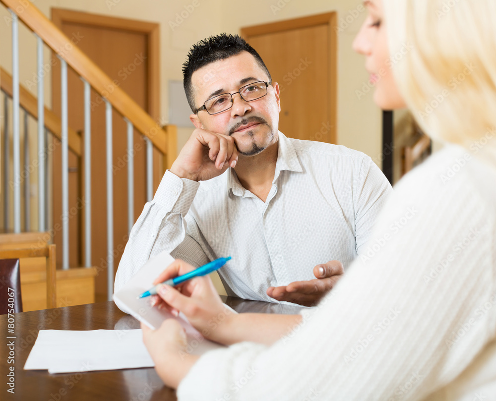 Couple filling questionnaire for employee Stock Photo | Adobe Stock