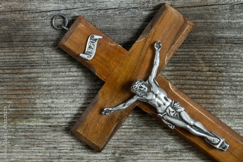 cross with crucified Jesus Christ on old rustic wood Stock Photo ...