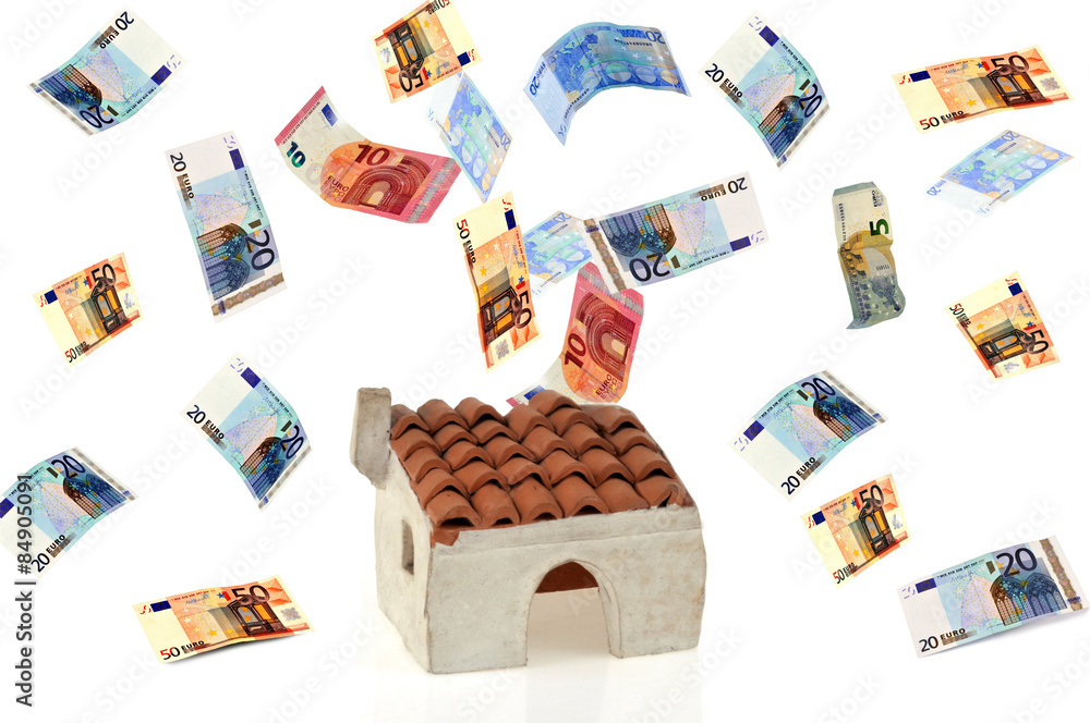 Photo Stock Pluie de billets de banque sur la maison | Adobe Stock