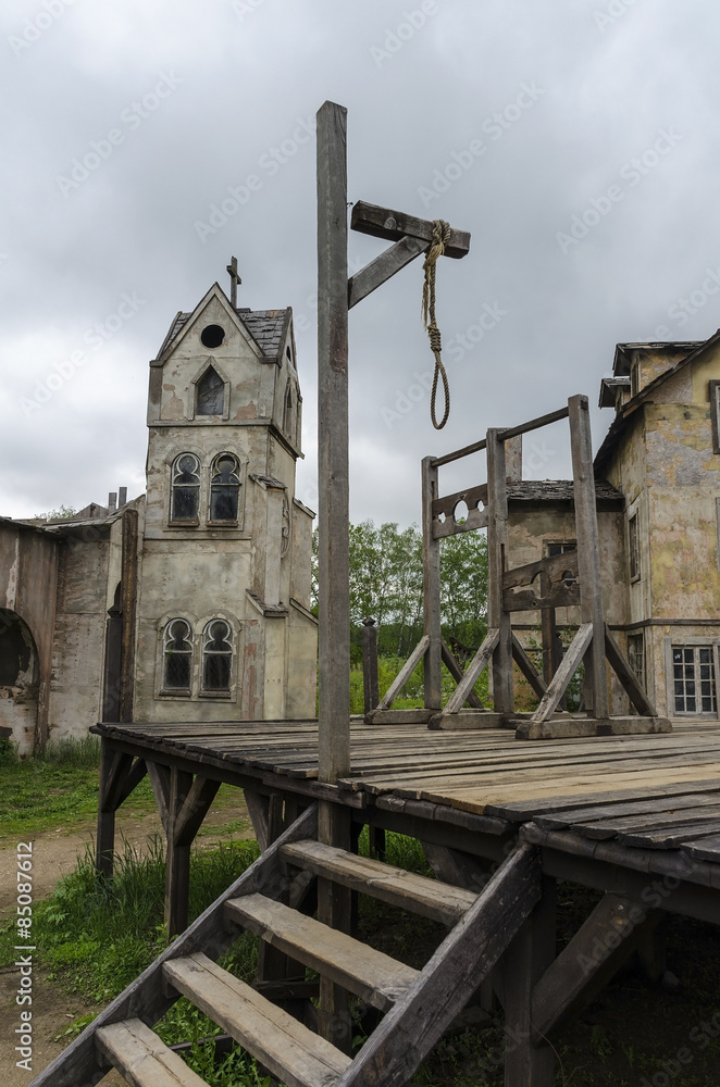 Medieval scaffold gallows in the square of the medieval town Stock ...