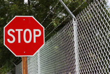 Stop Sign And Fence Free Stock Photo - Public Domain Pictures