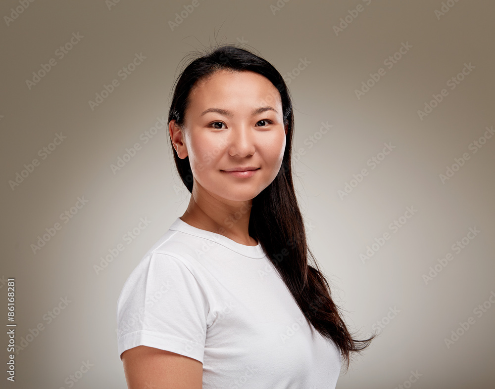 Stock-Foto „Portrait of young friendly asian woman“ | Adobe Stock