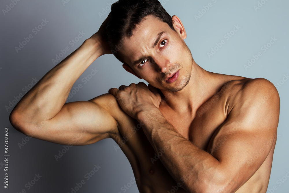 Bodybuilding and body sculpture concept. Handsome muscular male Stock ...