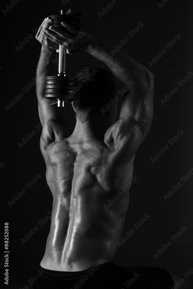 Vertical Fitness Background. Rear view of male muscular back and arms ...