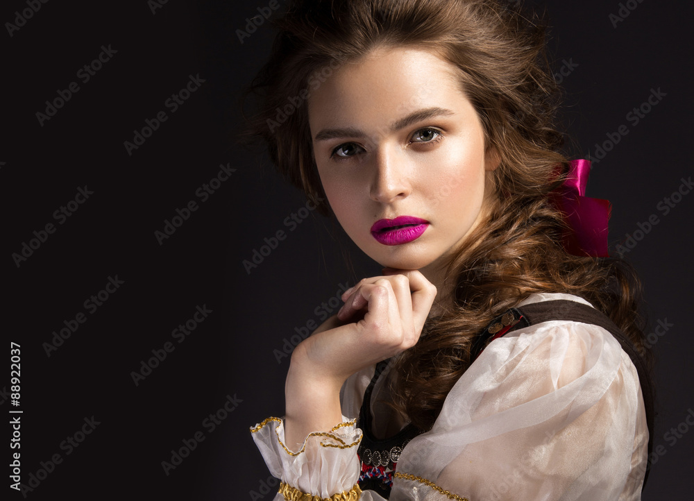 Beautiful Russian girl in national dress with a braid hairstyle and ...