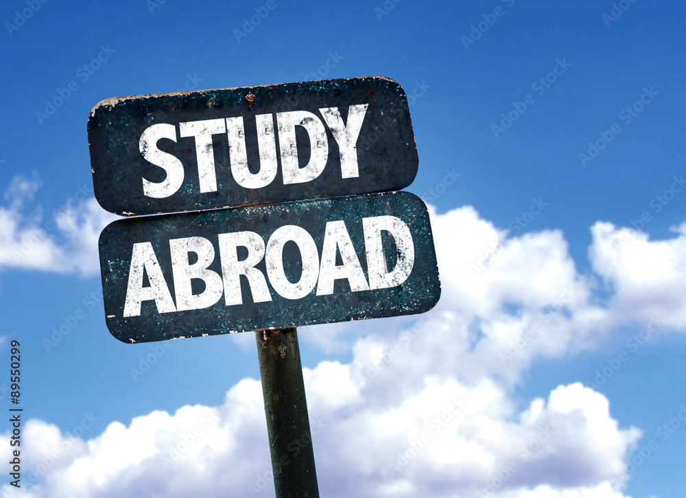 Study Abroad sign with sky background Stock Photo | Adobe Stock