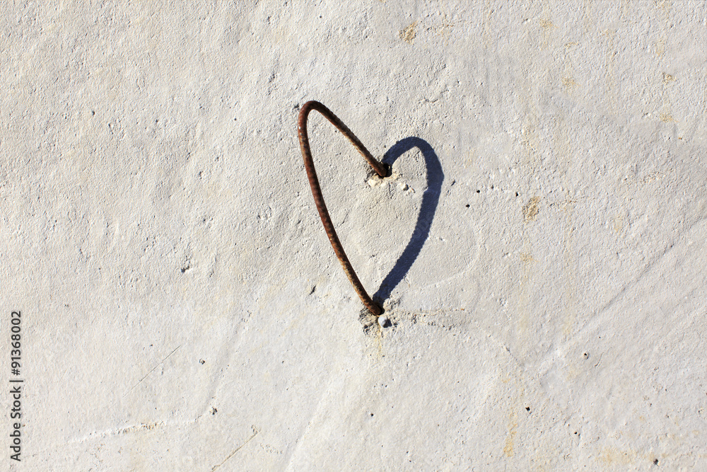 Foto unrequited love. the shadow of the assembly loops in the concrete ...
