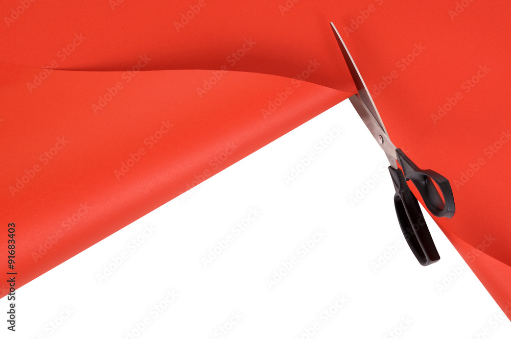 Scissors cutting red paper background showing revealing opening white ...