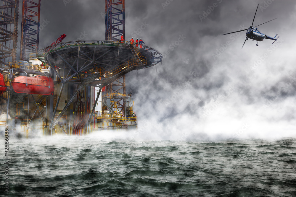 A helicopter rescue mission landing on Oil Rig. Stock Photo | Adobe Stock