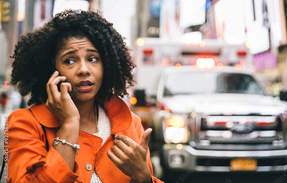 afro american woman calling 911 in New york city. concept about car ...