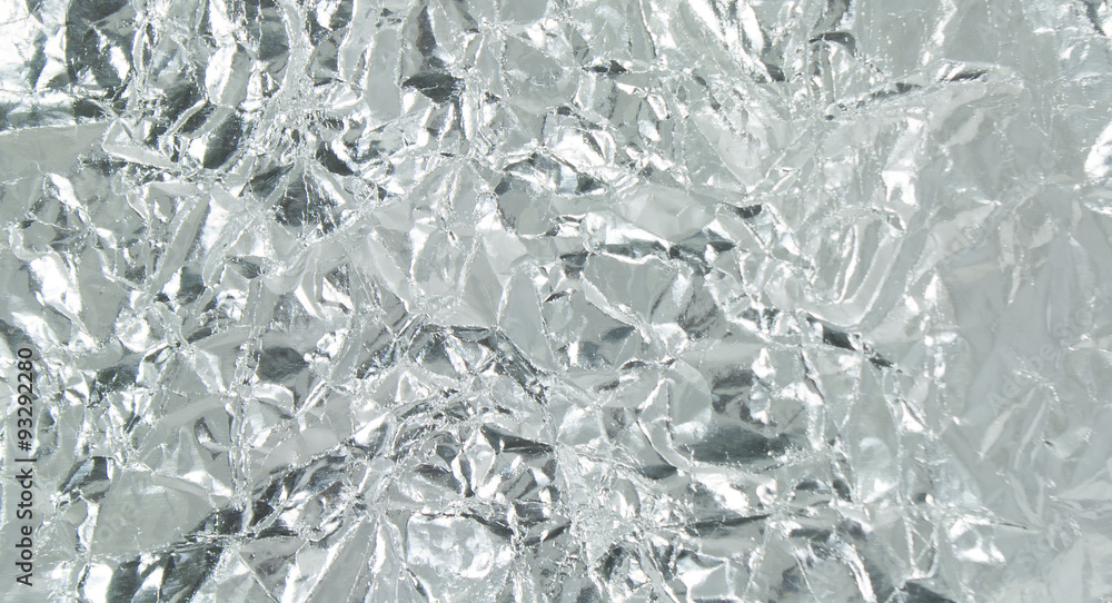 silver leaf foil background with shiny crumpled uneven surface for texture background. Stock ...