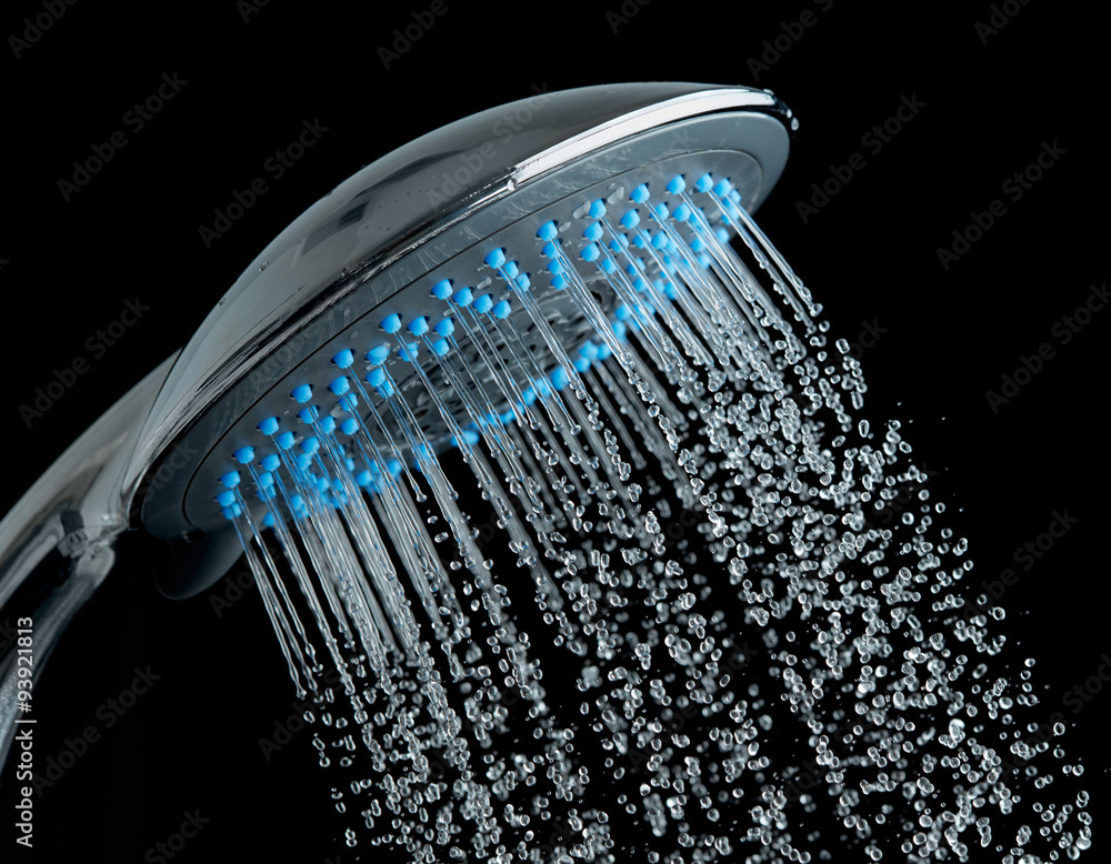 Shower with running water over black background Stock Photo | Adobe Stock