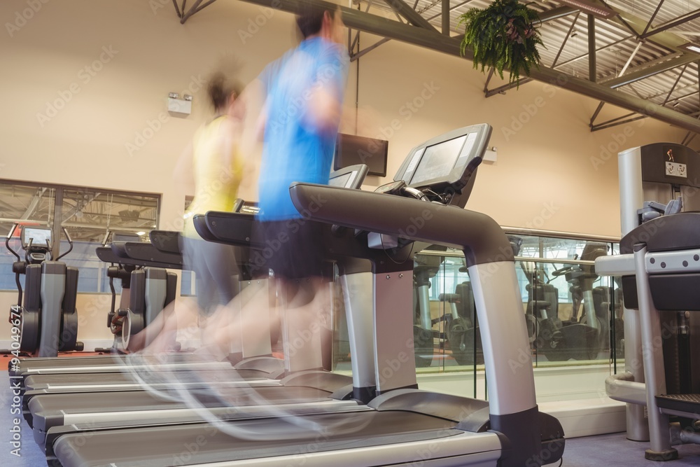 Fit people using the treadmill Stock Photo | Adobe Stock