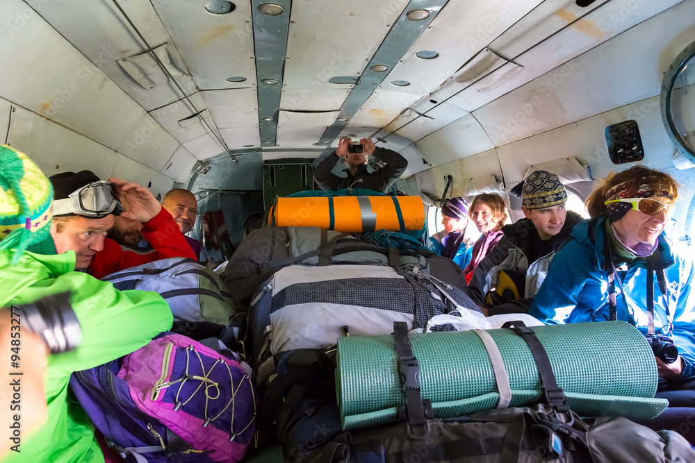 Passengers Inside Cargo Helicopter with Many Backpacks Group of ...