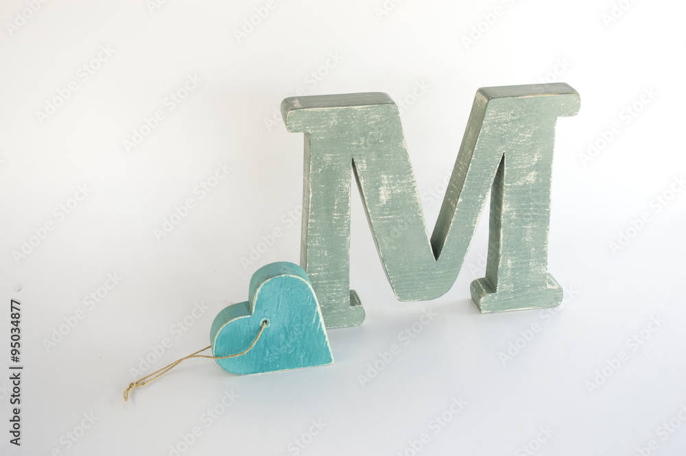 letra M con corazón Stock Photo | Adobe Stock